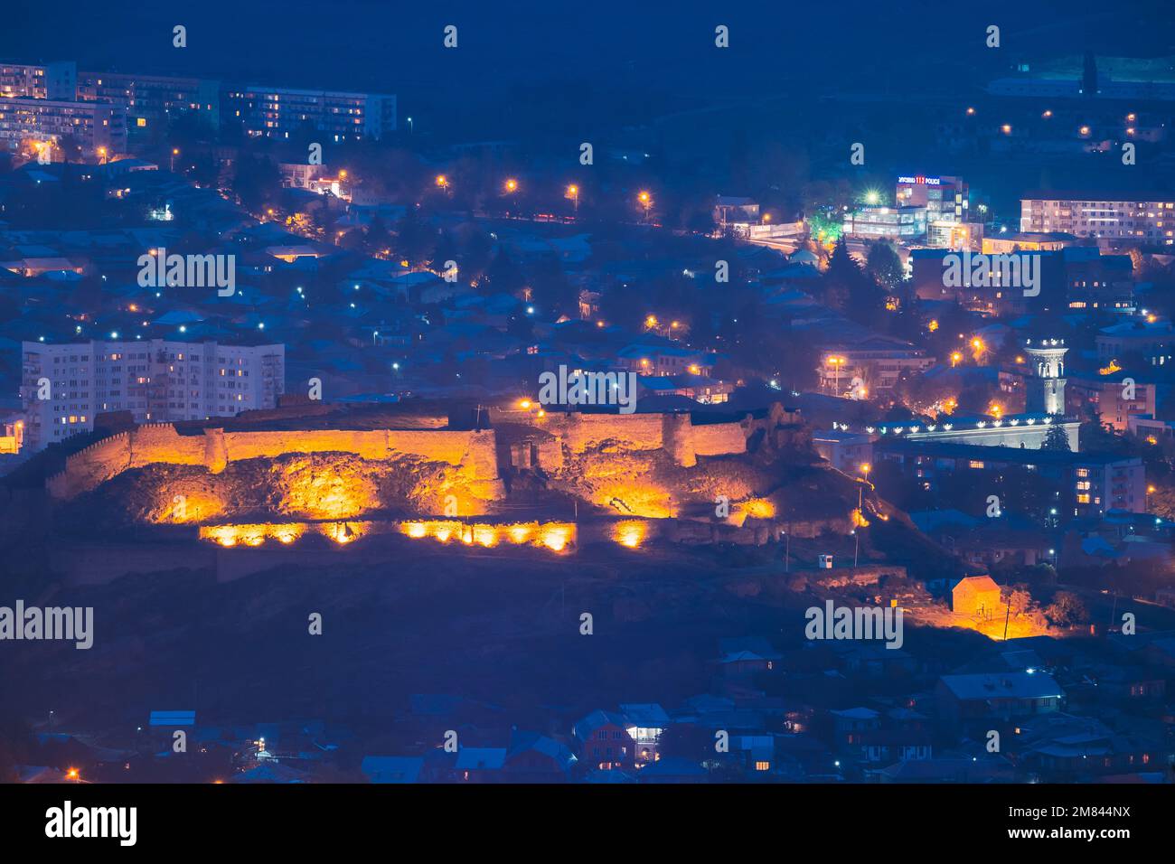 Medieval Citadel In Night Lights. Gori Fortress In Cityscape In Evening ...