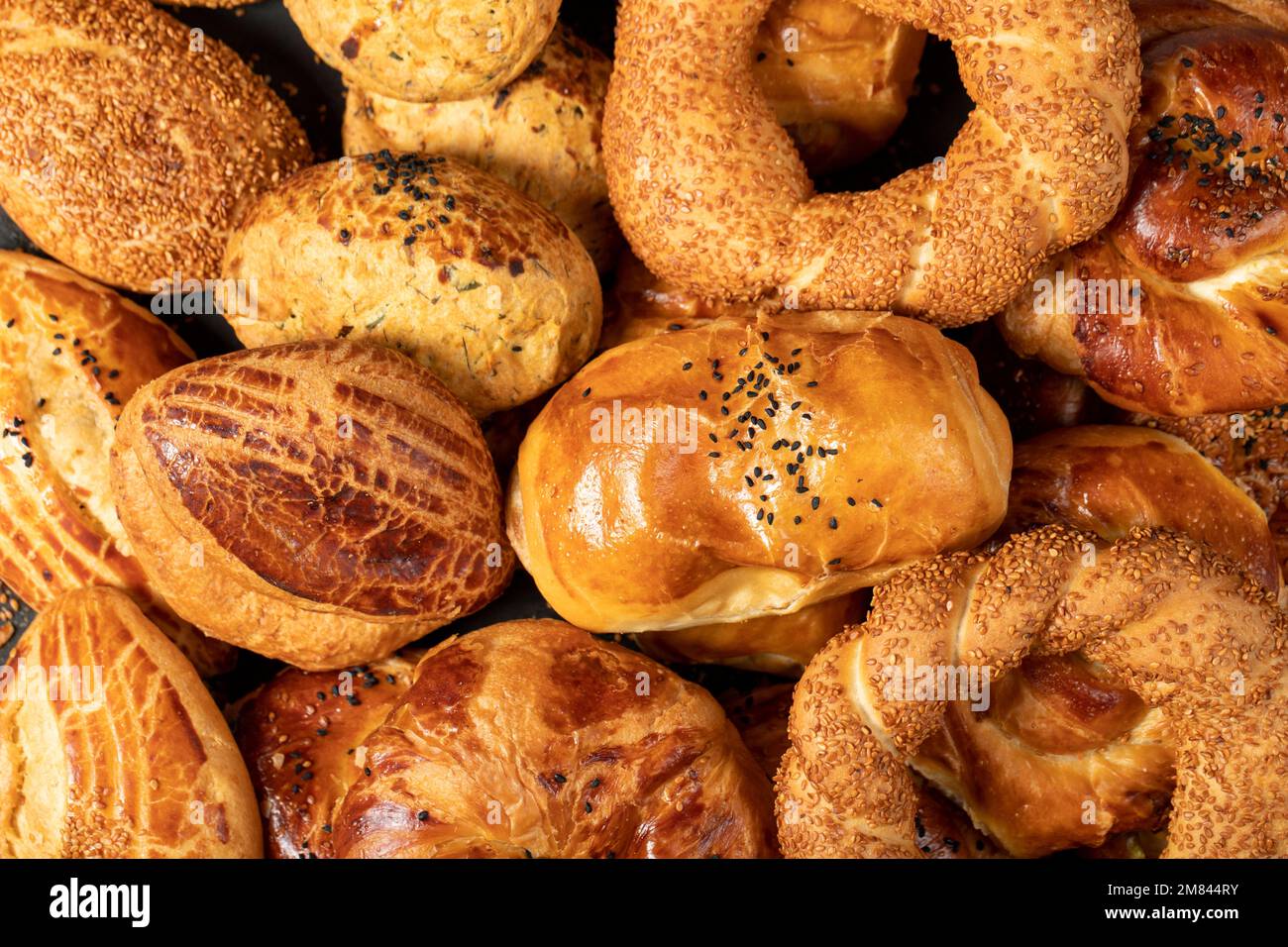 Bagel and pogaca varieties. They eat pastries in piles. Bakery products ...