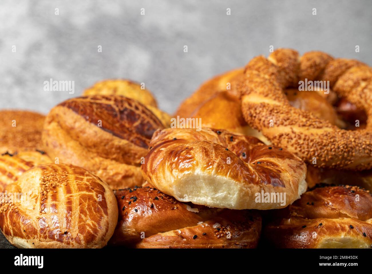 Bagel and pogaca varieties. They eat pastries in piles. Bakery products ...