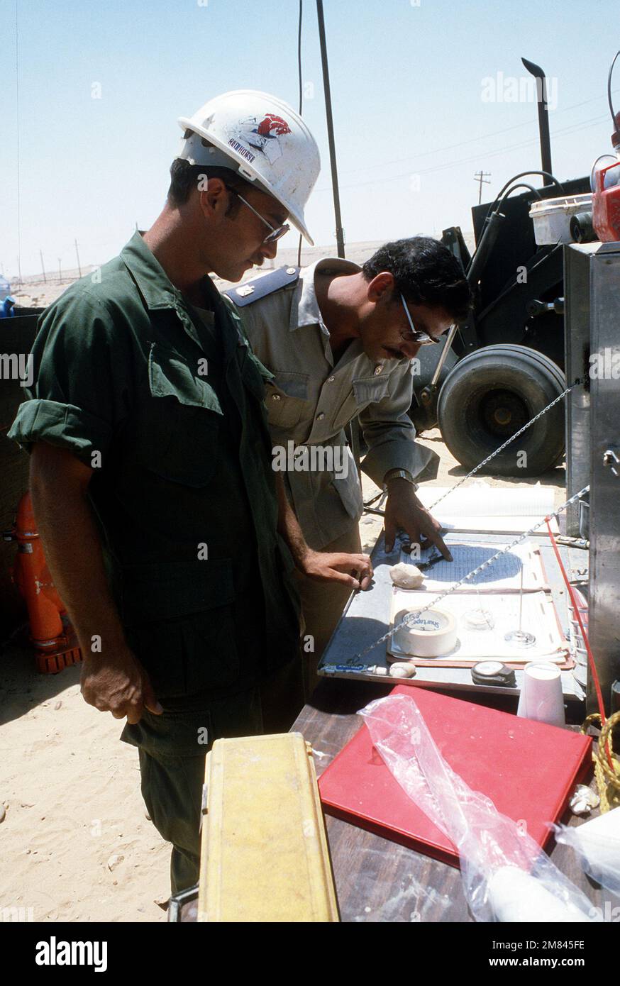 A member of the 823rd Civil Engineering Squadron discusses the well ...