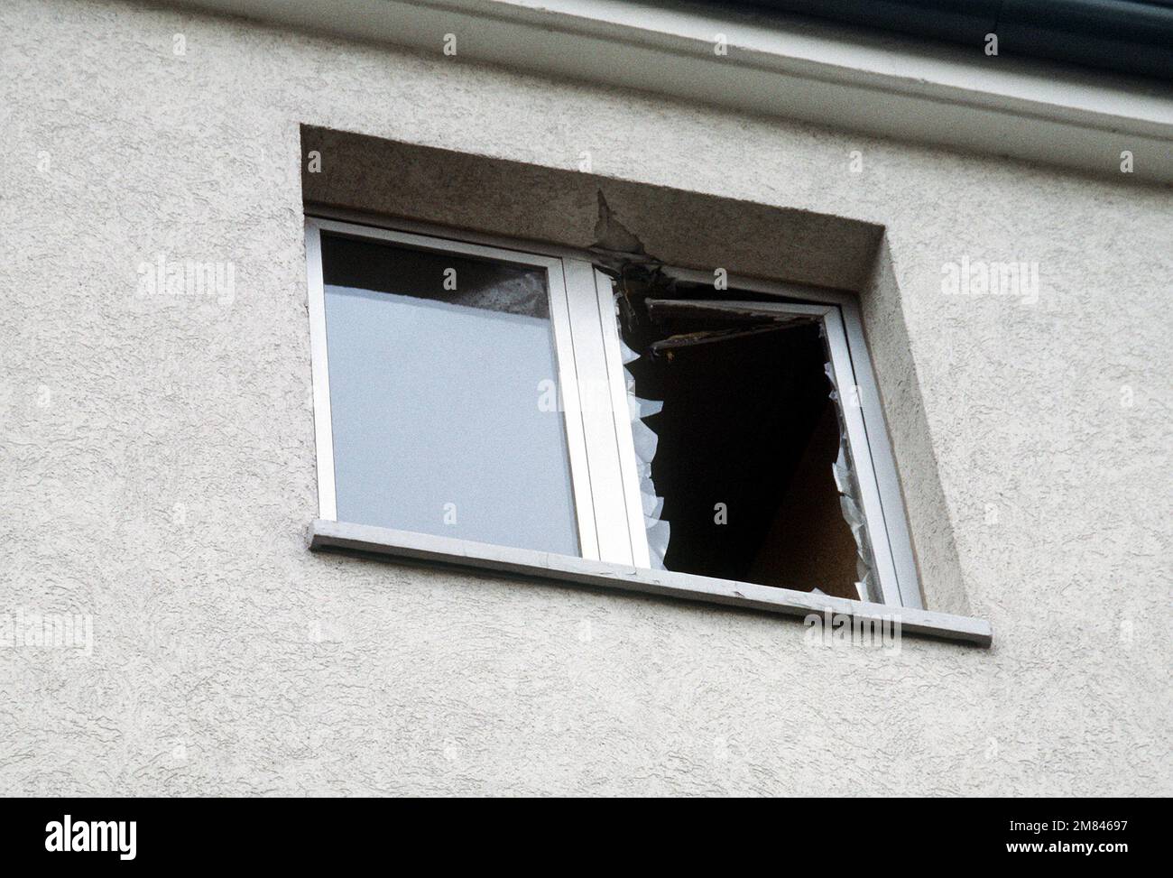 One of the many windows in Building 347 that was blown out when a car ...