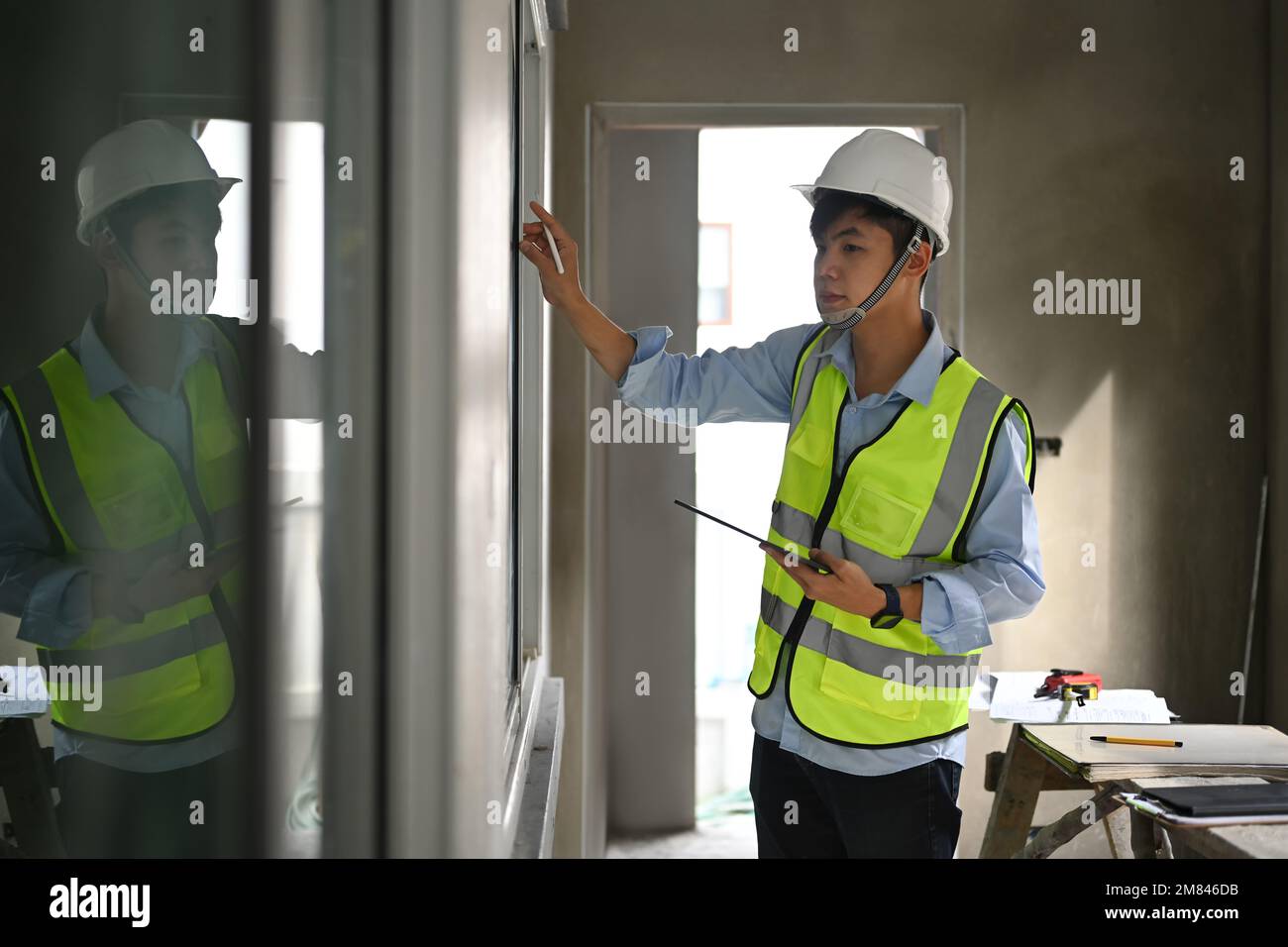 Image of civil engineer wearing hardhat working in construction site ...