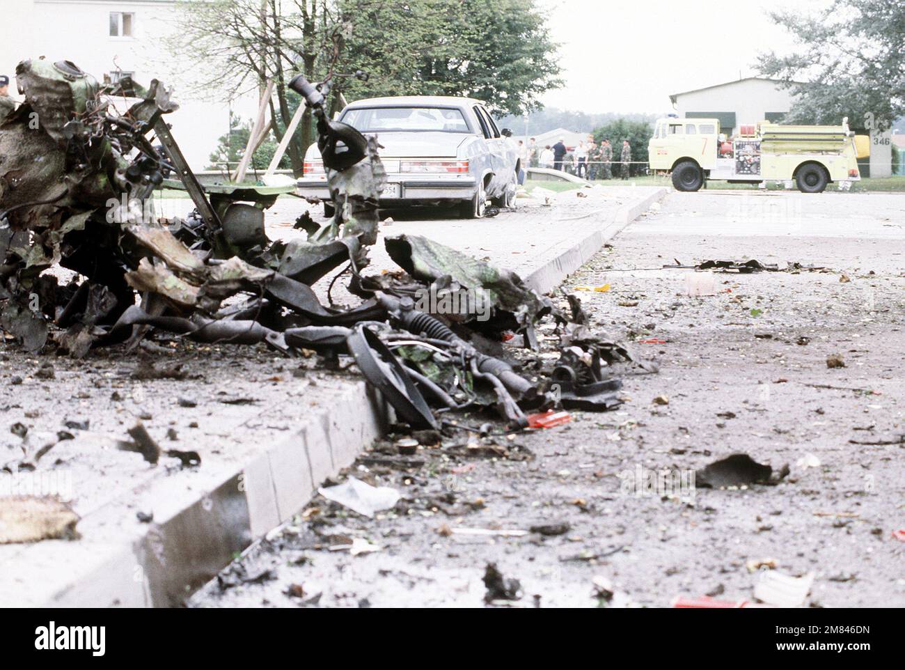 The remains of a car bomb that exploded behind the 435th Tactical Air ...