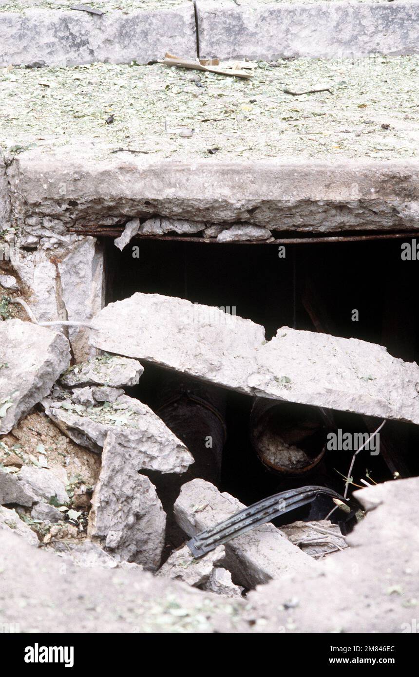 A car bomb exploded creating a crater and demolishing cars in the ...