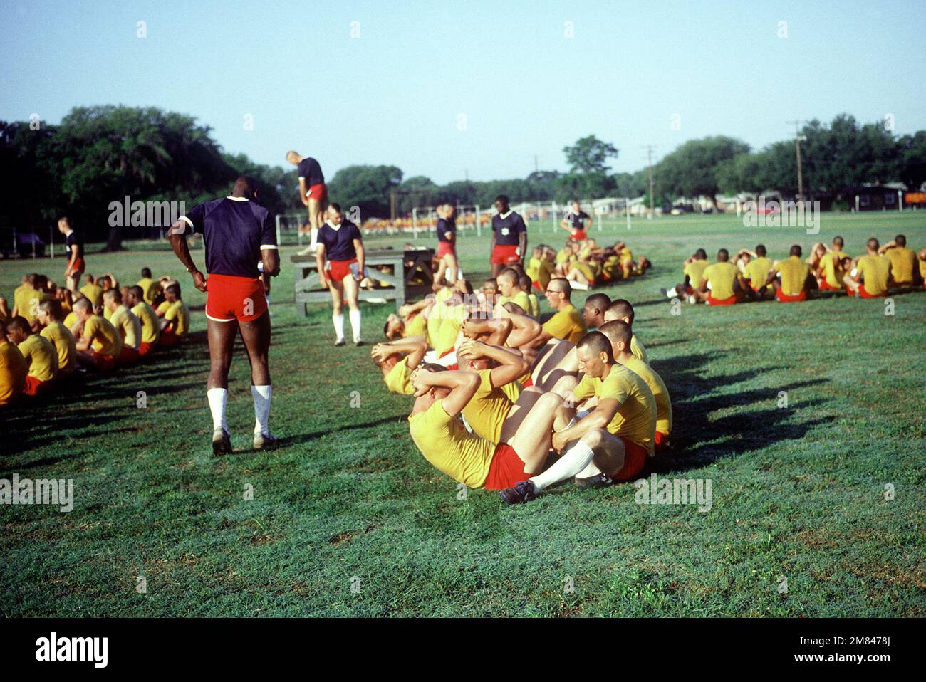 Marine recruits perform sit-ups during physical training at the Marine ...