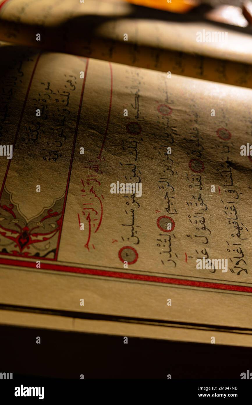 Holy Quran text in focus. Islamic background photo. Ramadan concept ...