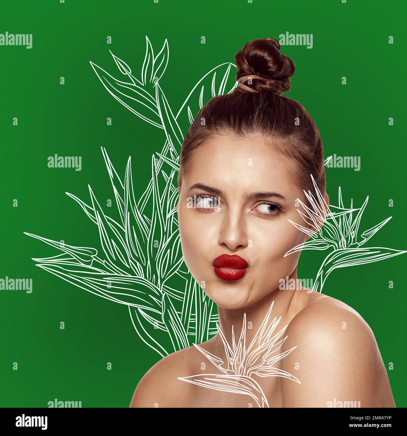 Kiss. Portrait of young beautiful girl posing over green background ...