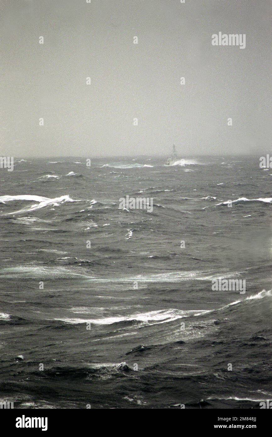 A ship operates in heavy seas during Operation Safari '85. Subject ...