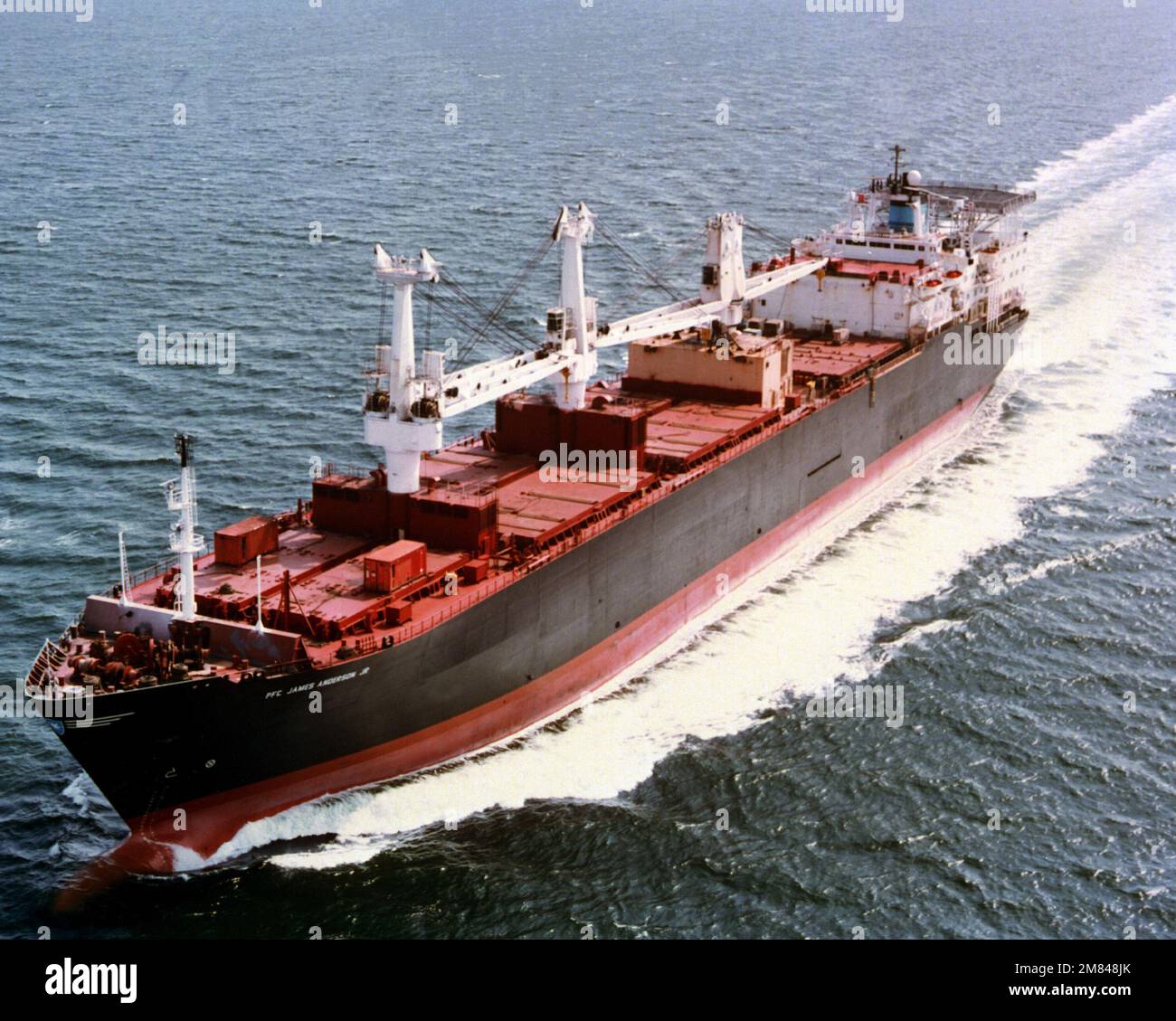 An elevated port bow view of the Maritime Prepositioning Ship SS PFC ...