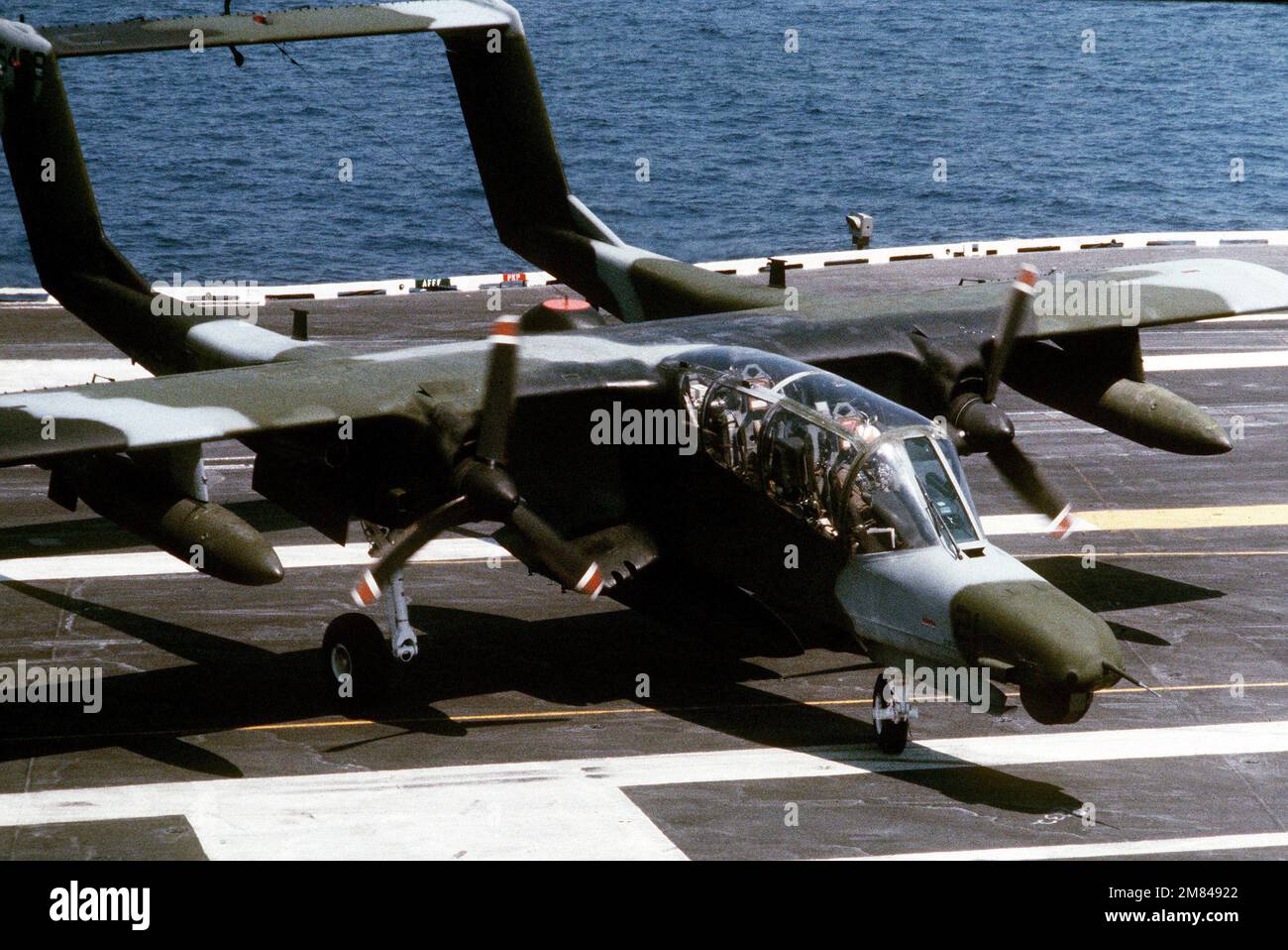 High angle view down at an OV-10D Bronco Observation Aircraft as it ...