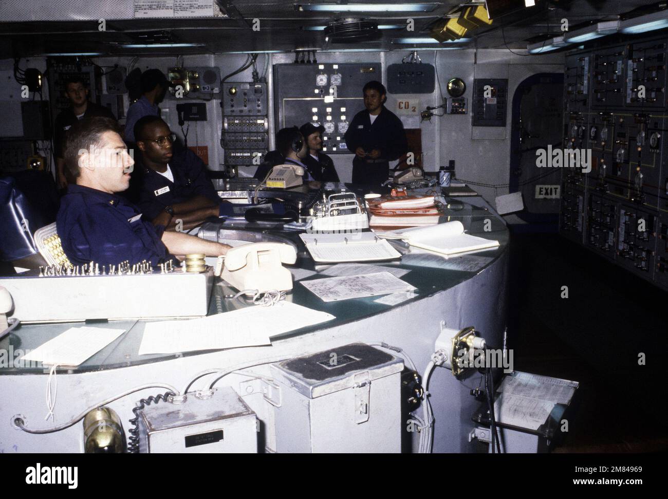 Electrician Mates monitor the main electrical control console in the ...