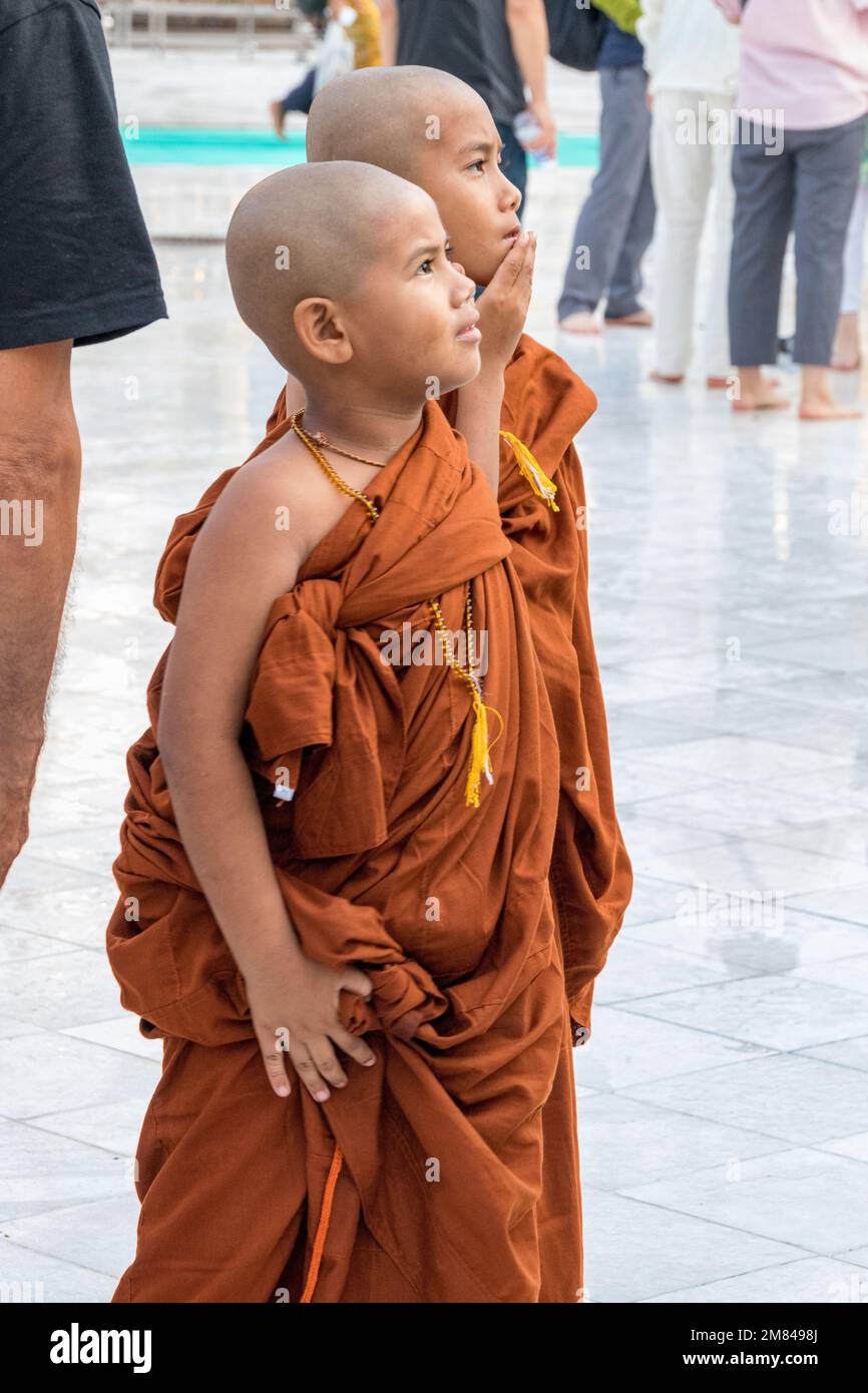 two child buddhist monk students with traditional red robe Stock Photo ...