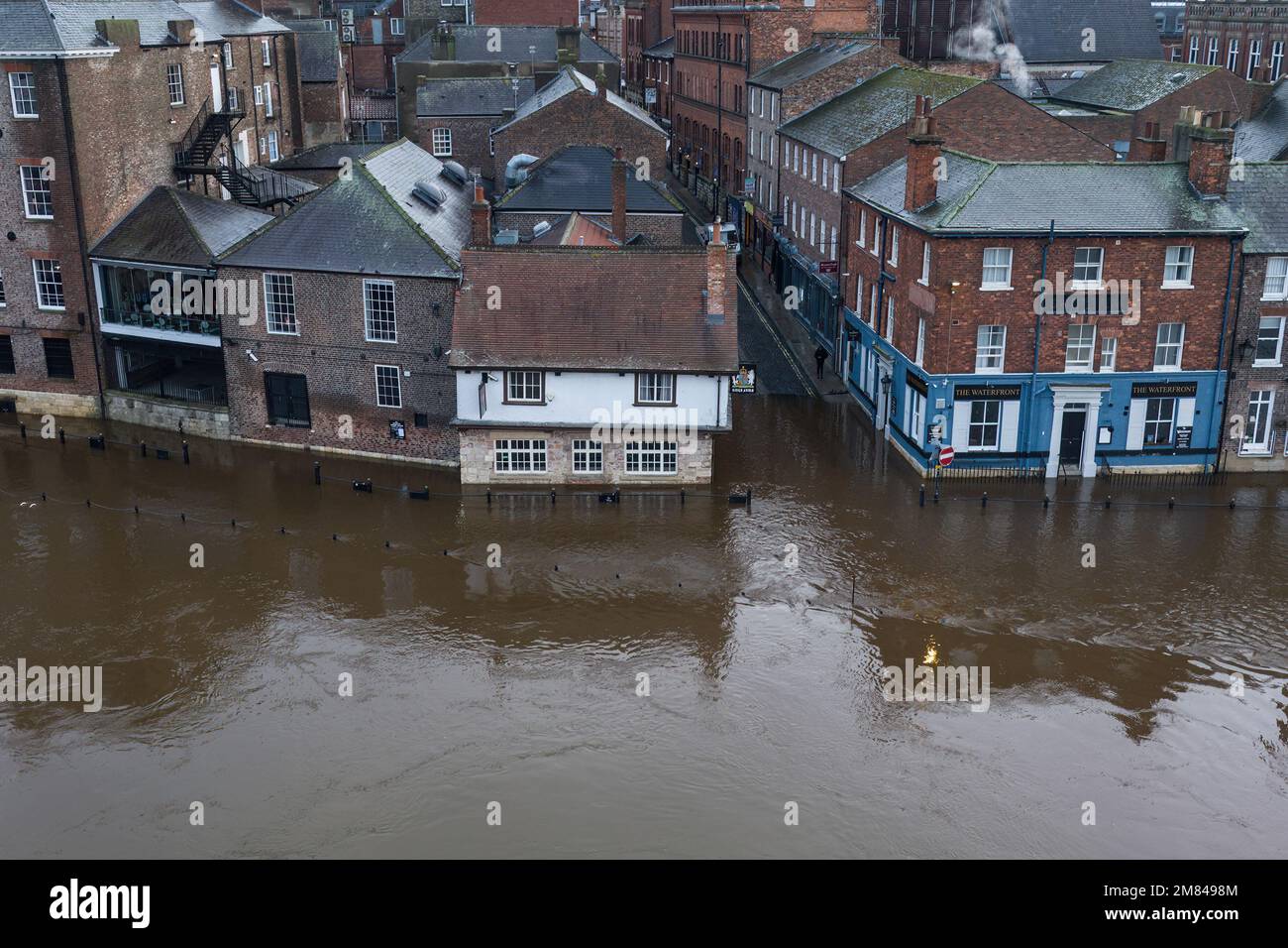 York, UK. 12th Jan, 2023. The Kings Arms if flooded as heavy rain ...