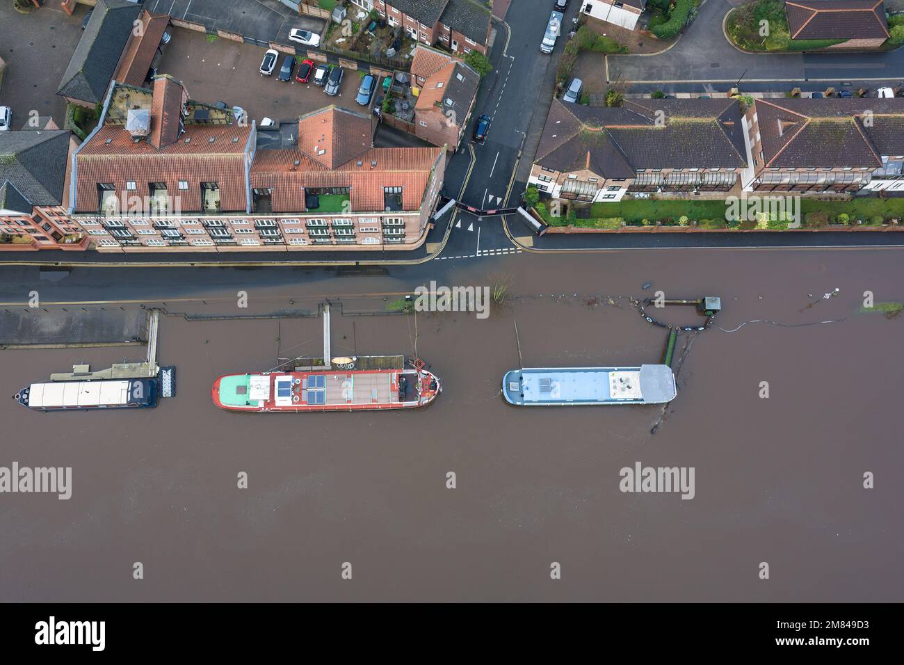 York, UK. 12th Jan, 2023. Road flood defences are put in place as heavy ...
