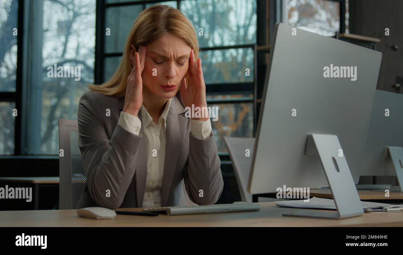 Frustrated sick ill sad Caucasian middle-aged adult woman mature ...