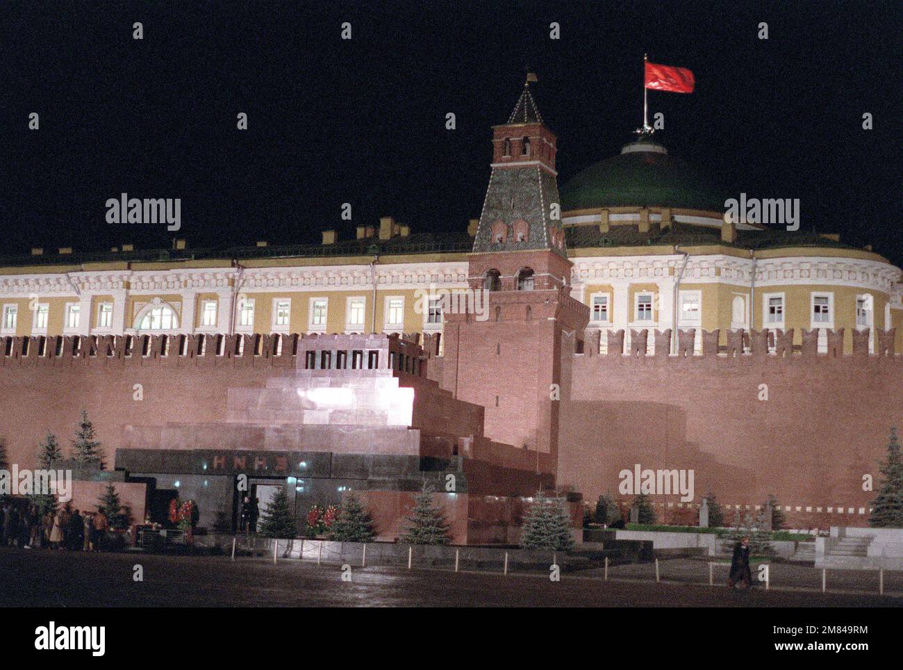 A nighttime view in Red Square showing the Lenin Mausoleum. Behind the ...