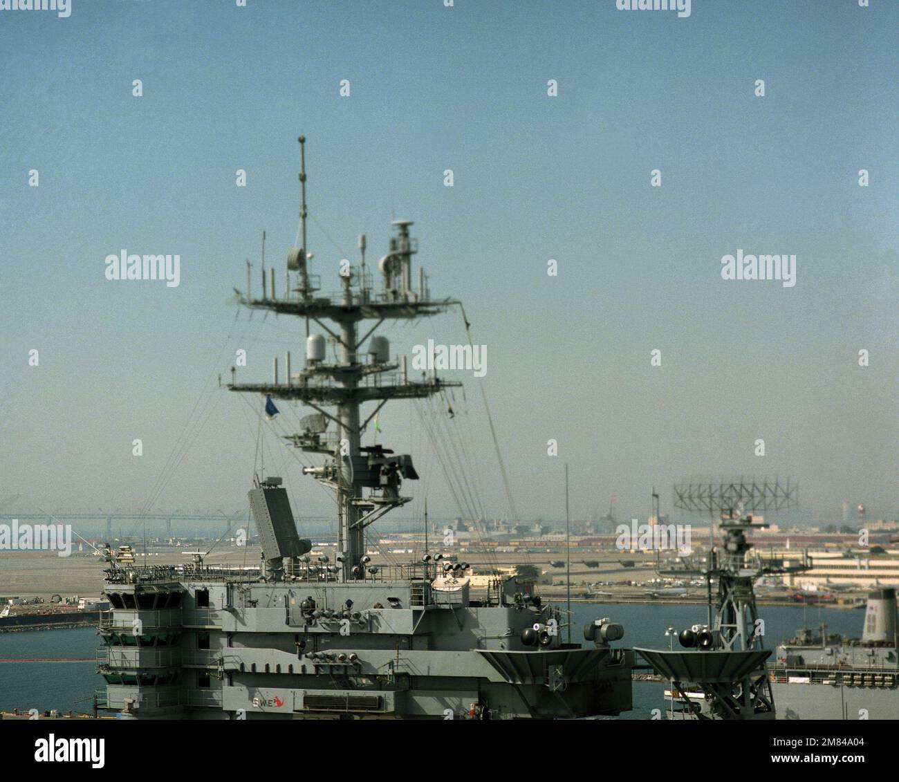 A view of various antennas mounted on the mast and island of the ...