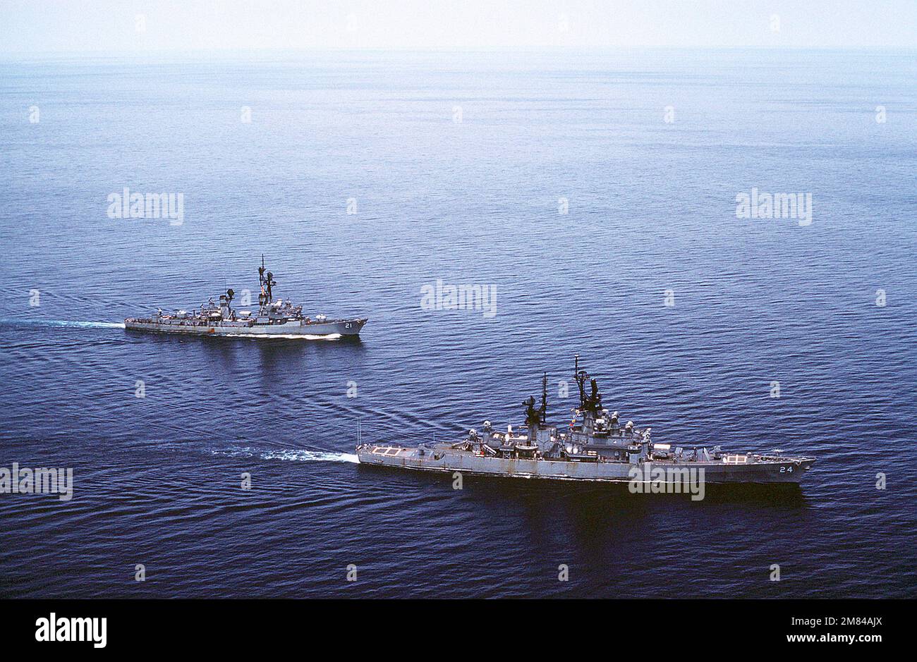 An aerial starboard beam view of the guided missile cruiser USS REEVES ...