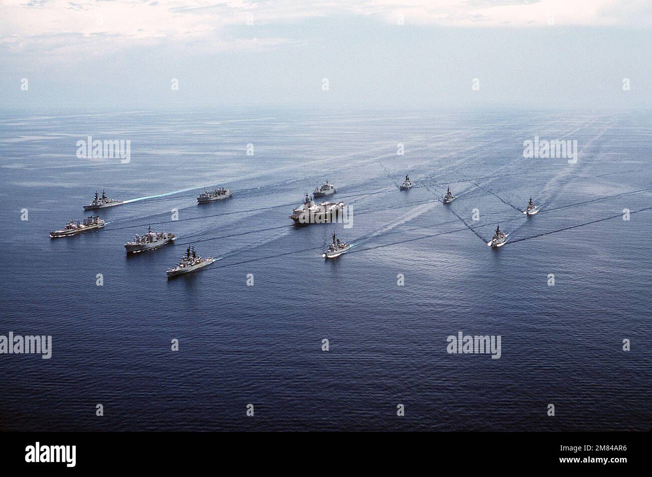 Aerial port bow view of Battle Group Alfa underway. The ships are ...