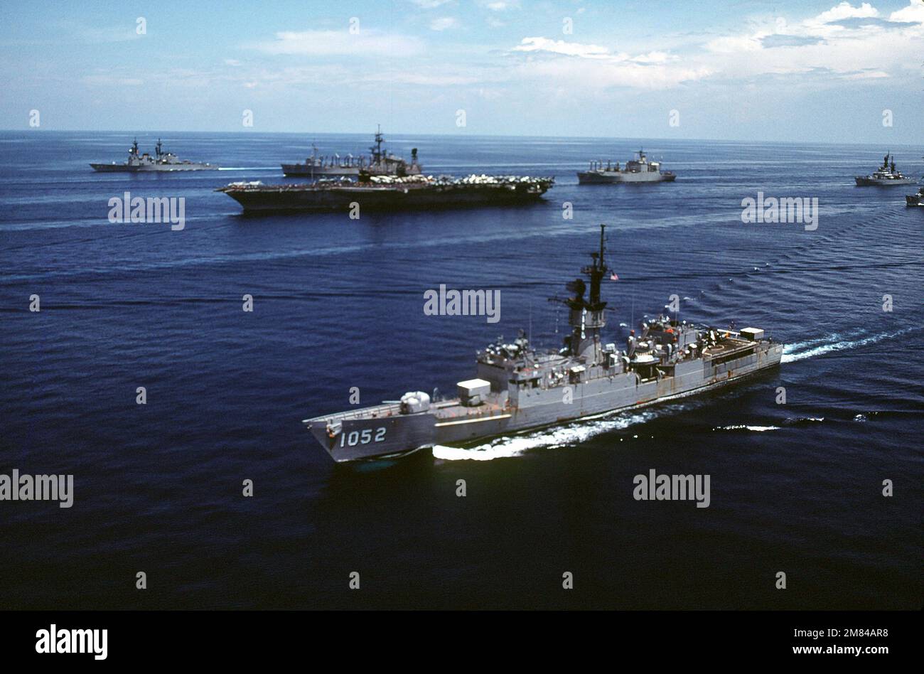 Aerial port bow view of Battle Group Alfa underway: (from front to back ...
