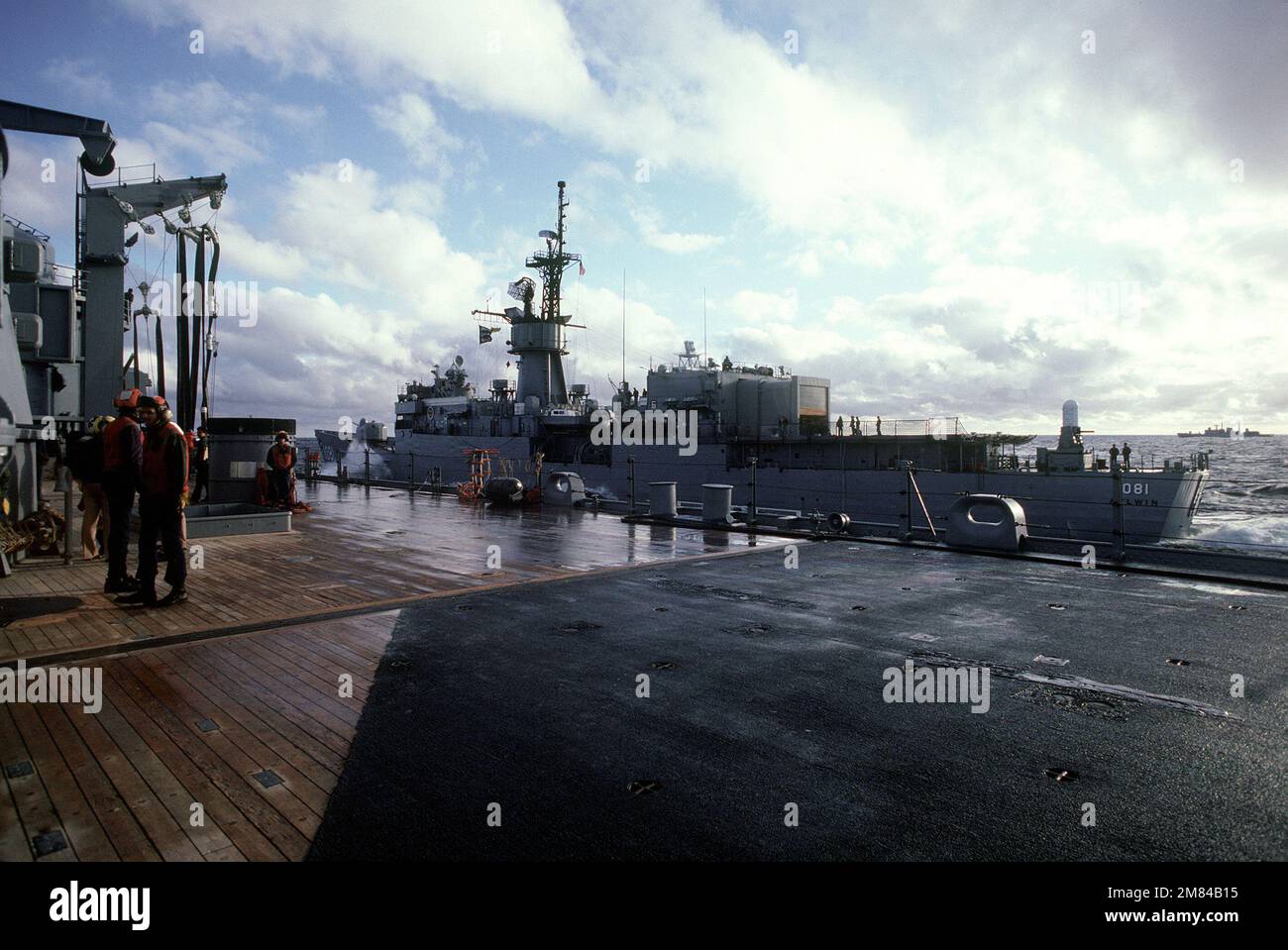 The frigate USS AYLWIN (FF-1081) operates alongside the battleship USS ...