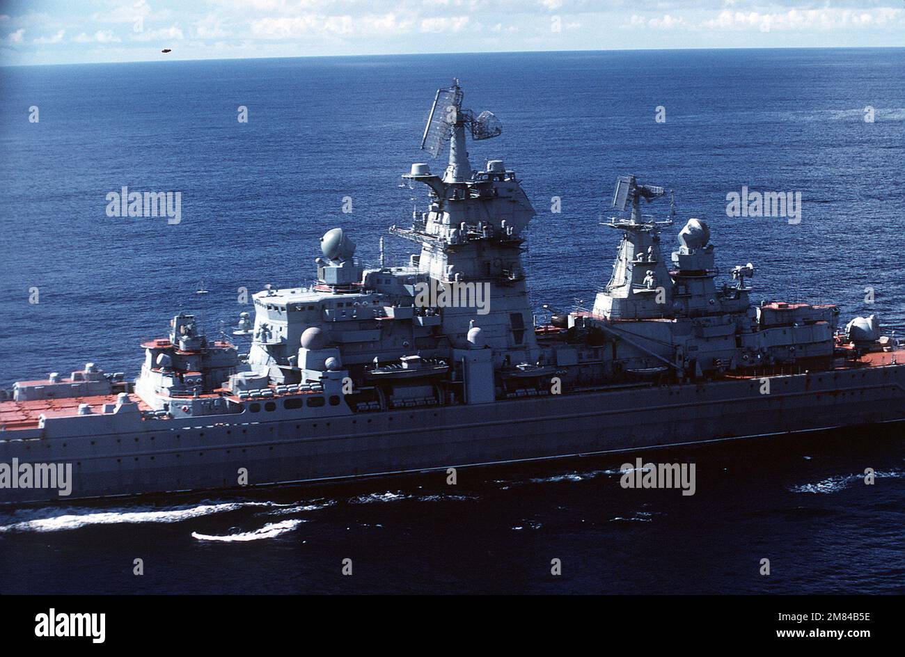 Aerial port view (amidships) of the Soviet Kirov Class nuclear-powered ...