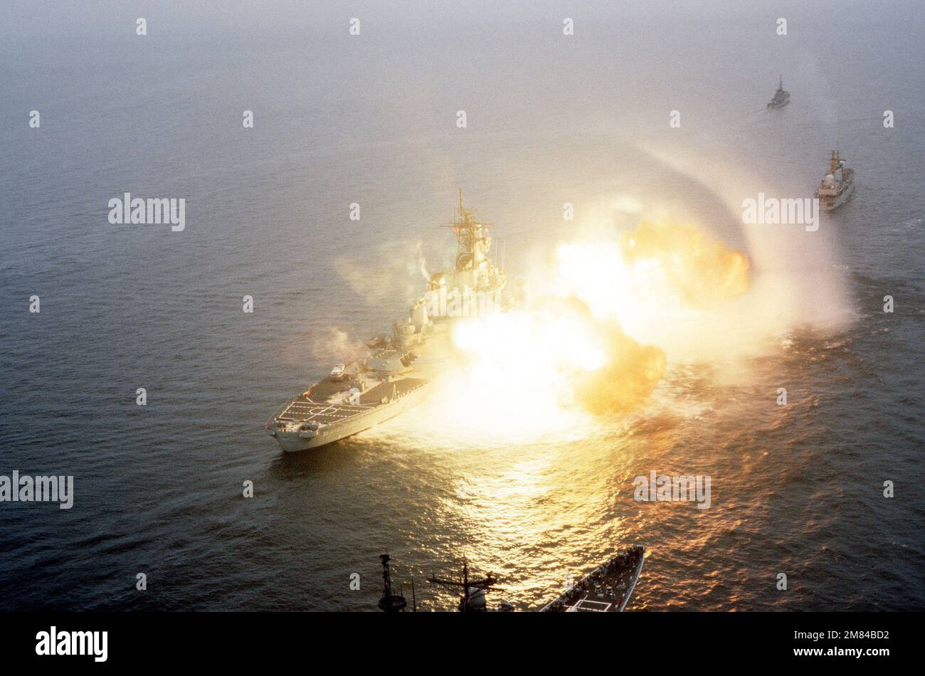 The battleship USS IOWA (BB 61) fires its Mark 7 16-inch/50 caliber ...