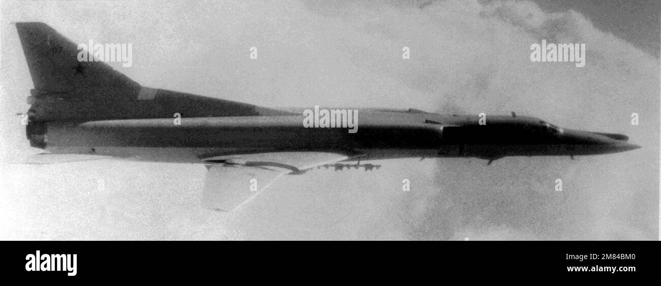 Air-to-air right side view of a Soviet Tu-22M Backfire aircraft ...