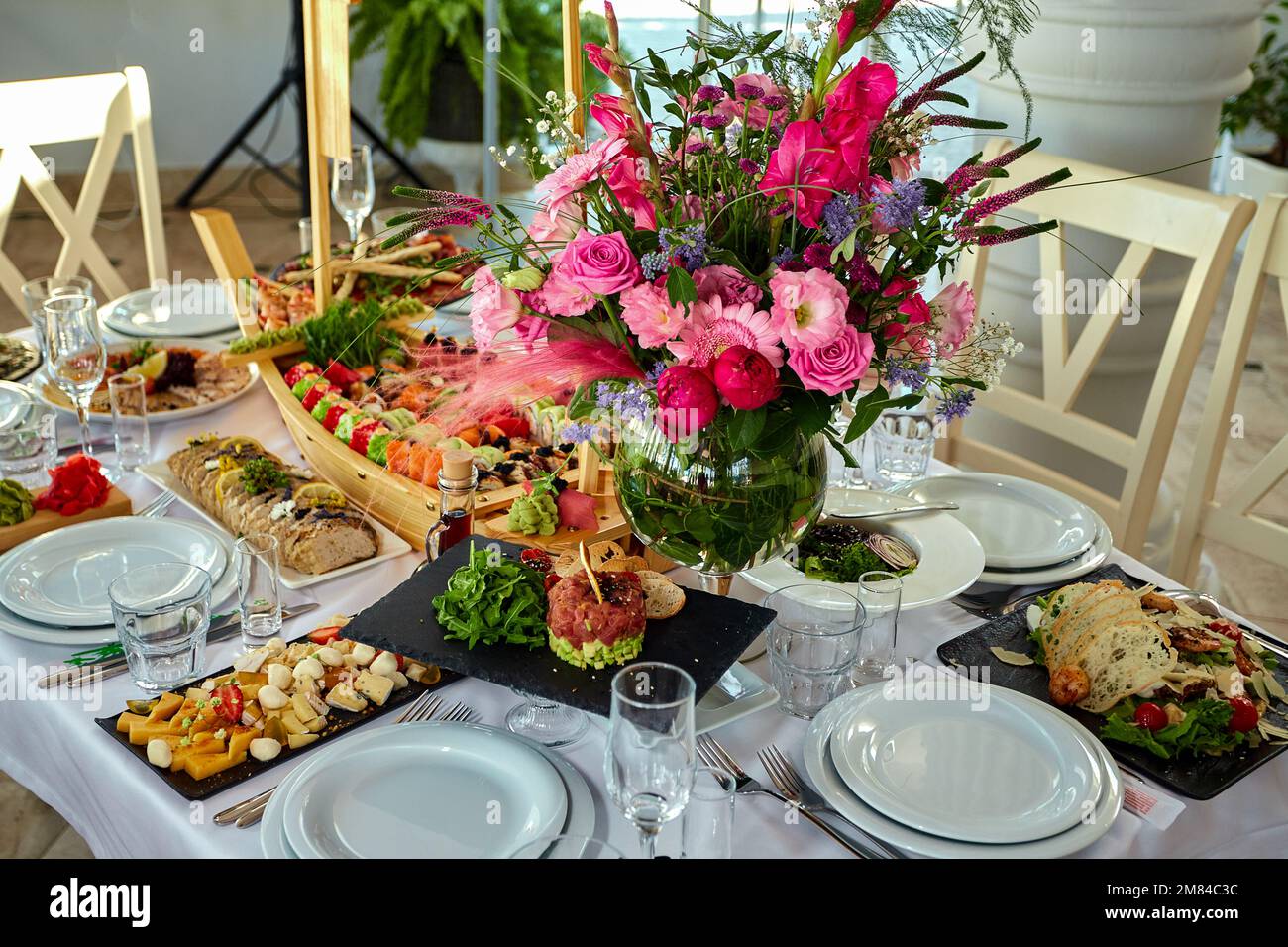 Served furshet table with various banquet dishes Stock Photo - Alamy