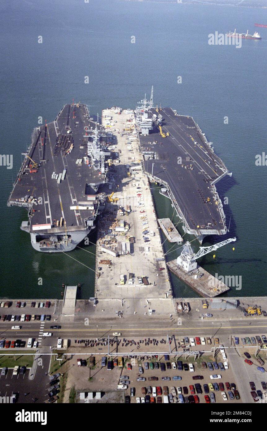 An elevated view of nuclear-powered aircraft carriers USS NIMITZ (CVN ...