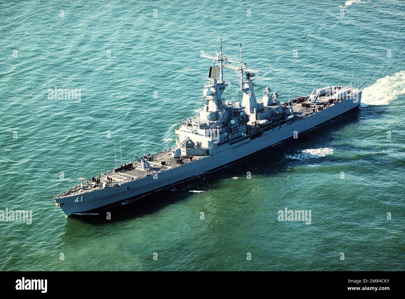 An elevated port bow view of the nuclear-powered guided missile cruiser ...
