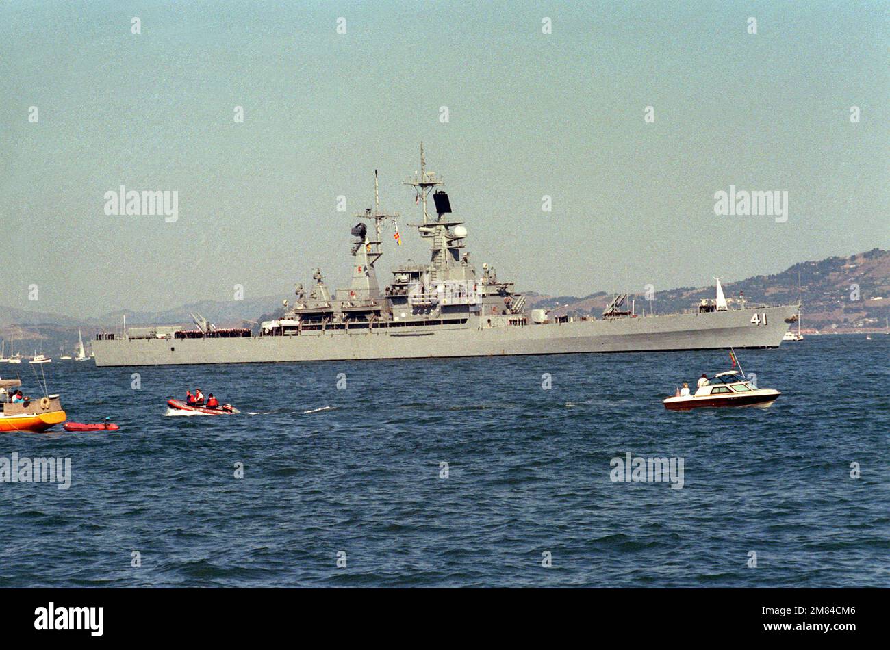 The nuclear-powered guided missile cruiser USS ARKANSAS (CGN-41) passes ...