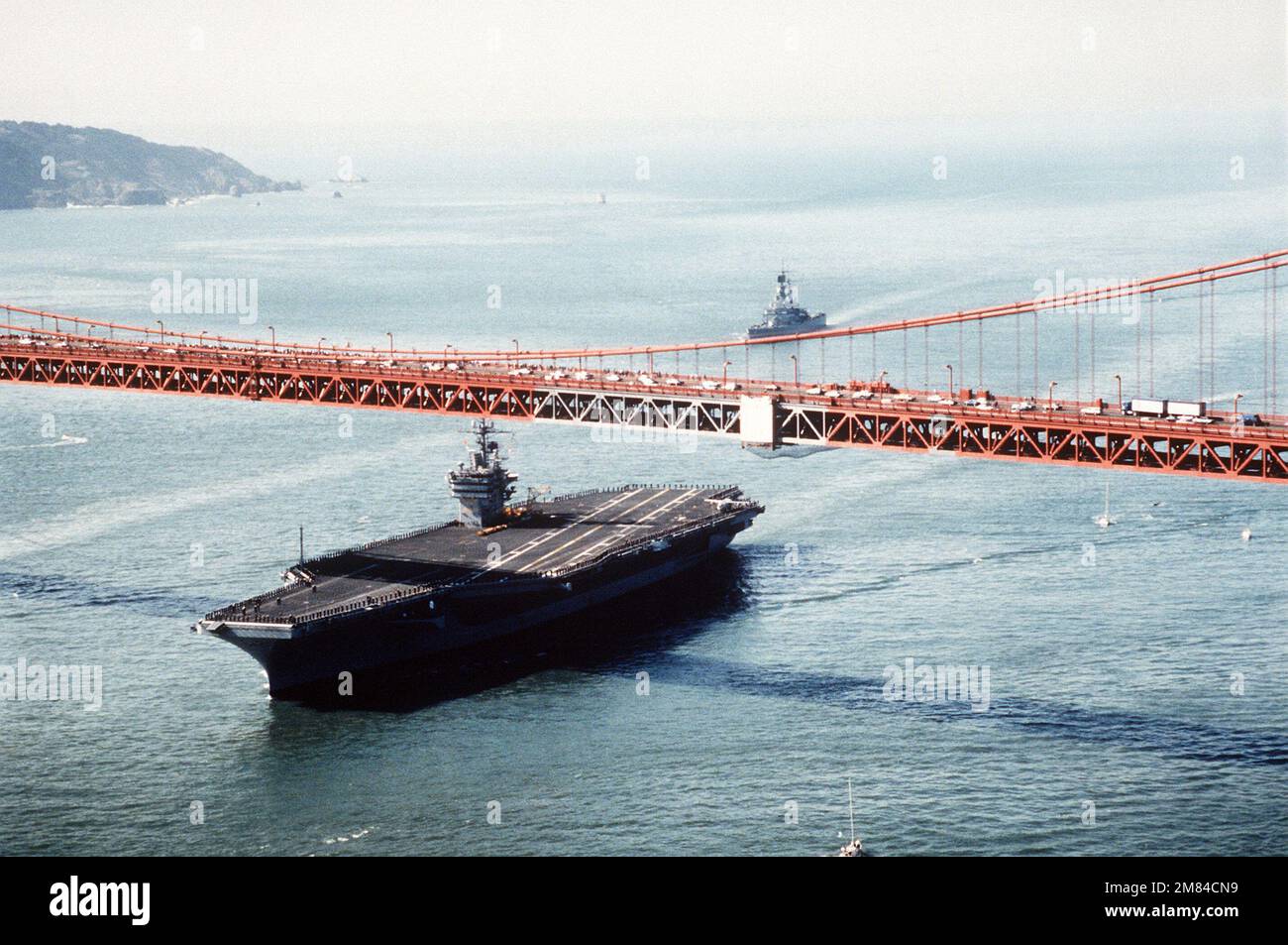 The nuclear-powered aircraft carrier USS CARL VINSON (CVN-70) passes ...