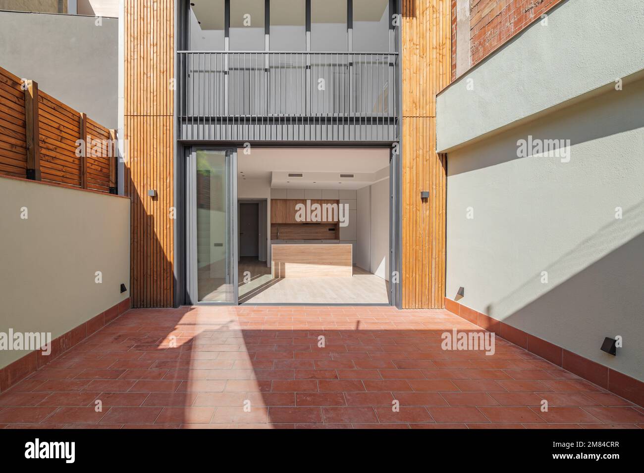 Frontal view of wooden and metal contemporary building facade with ...