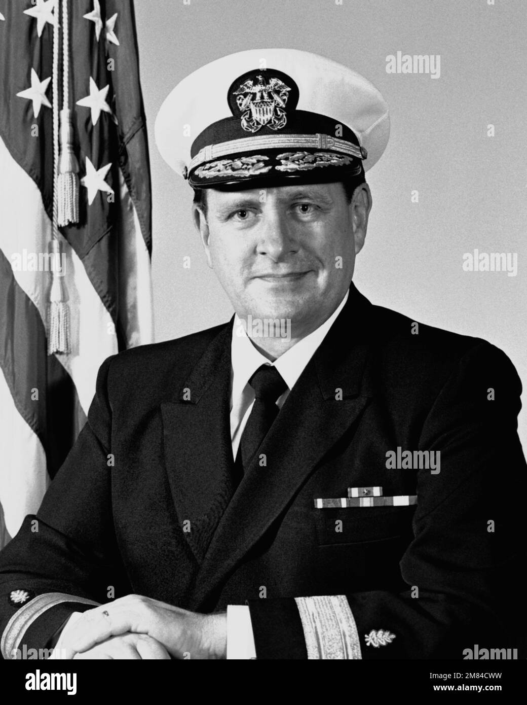 Rear Admiral (RDML) (lower half) Robert W. Koch, USN (covered ...