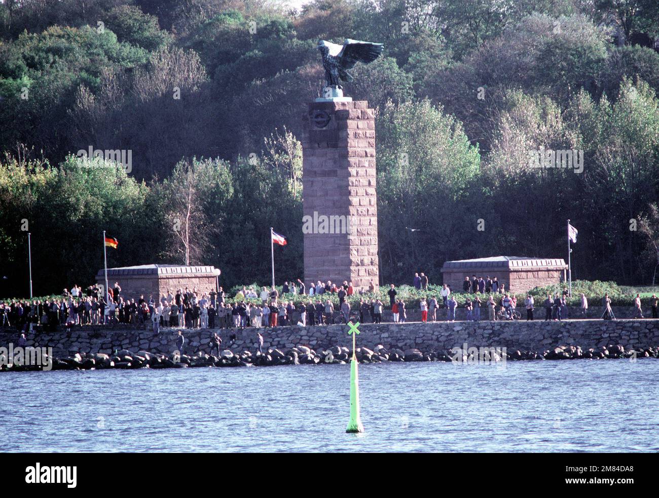 Residents of Kiel watch the arrival of the battleship USS IOWA (BB-61 ...
