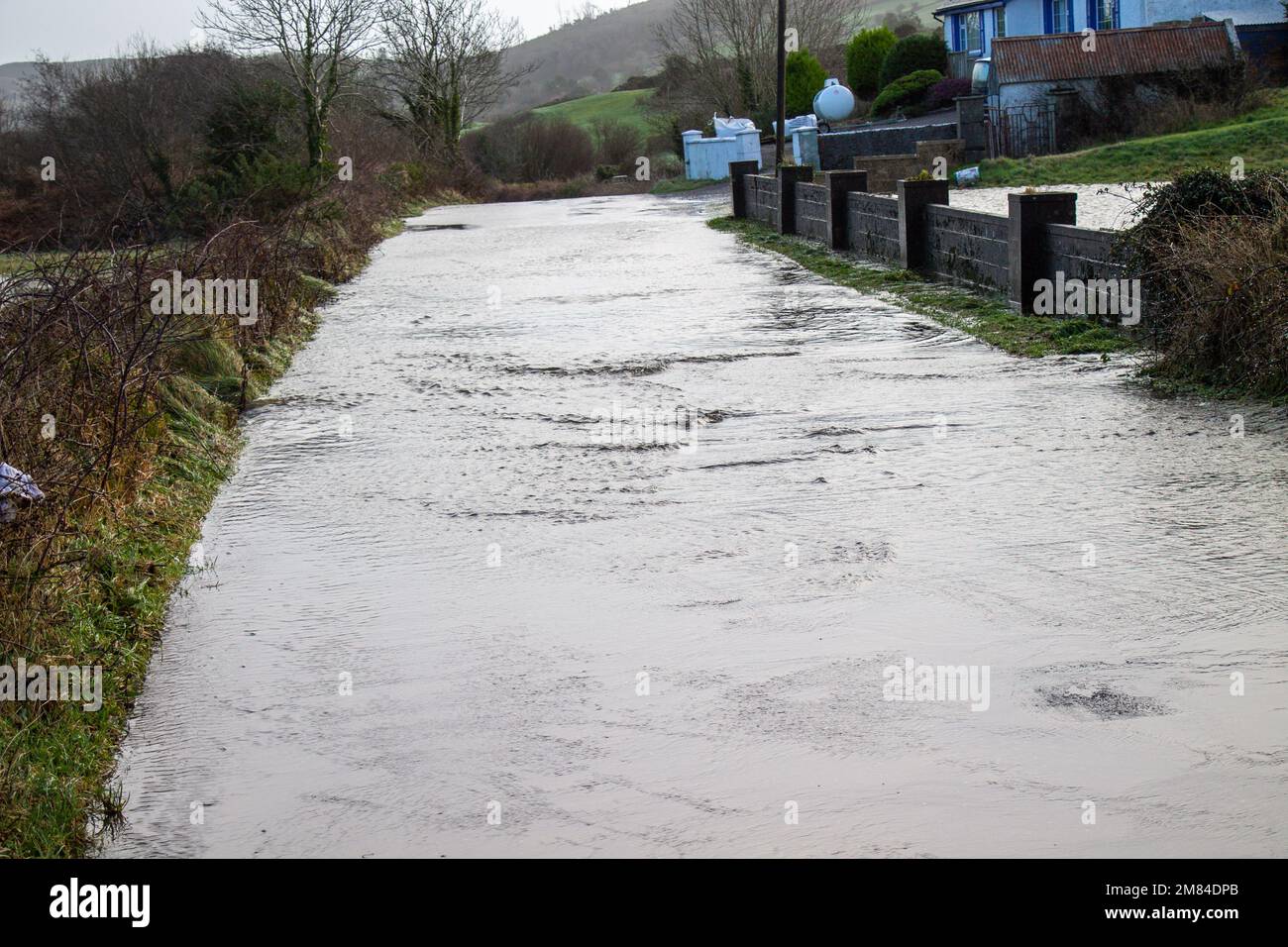 Road covered in winter flood waters Stock Photo - Alamy