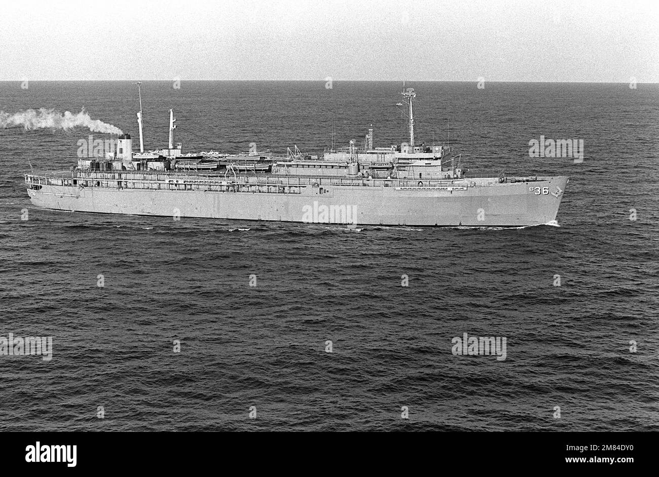 A starboard beam view of the submarine tender USS L.Y. SPEAR (AS-36 ...