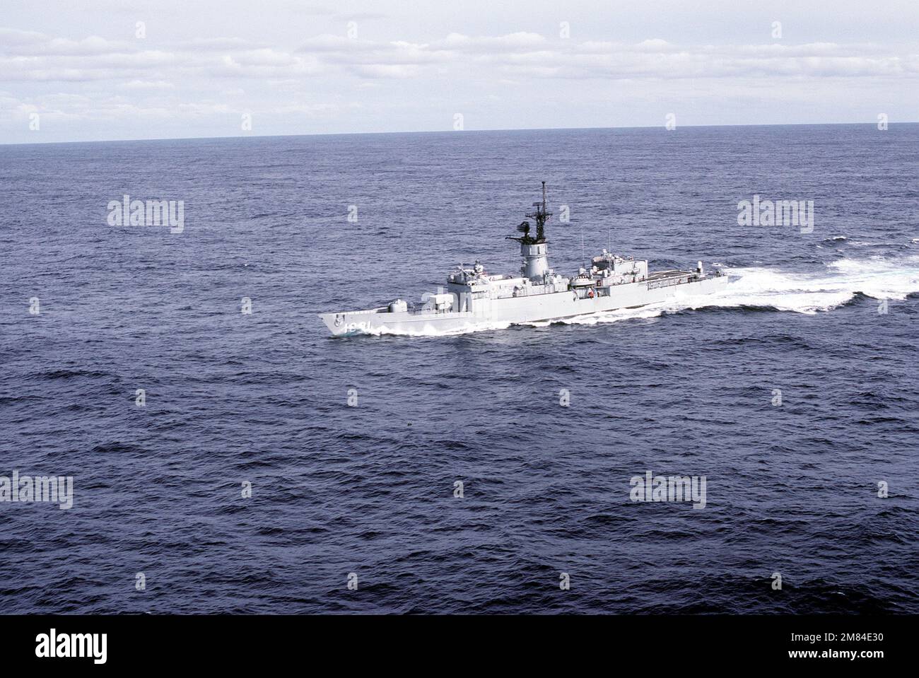 An elevated port bow view of the frigate USS AYLWIN (FF-1081) underway ...