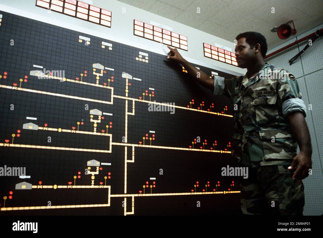 A member of the Petroleum Distribution System Okinawa monitors the ...