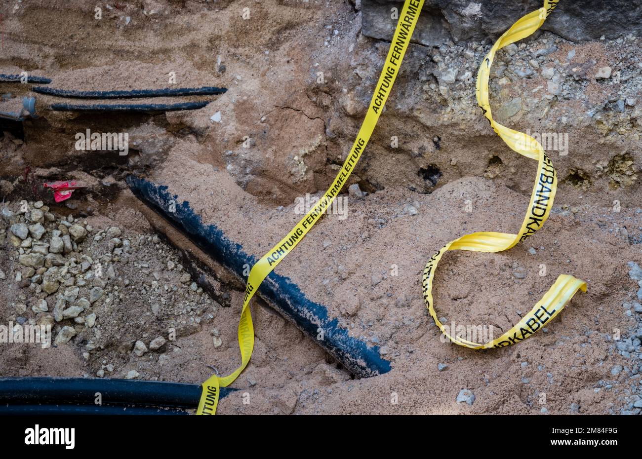 Laying a power line construction site Stock Photo - Alamy