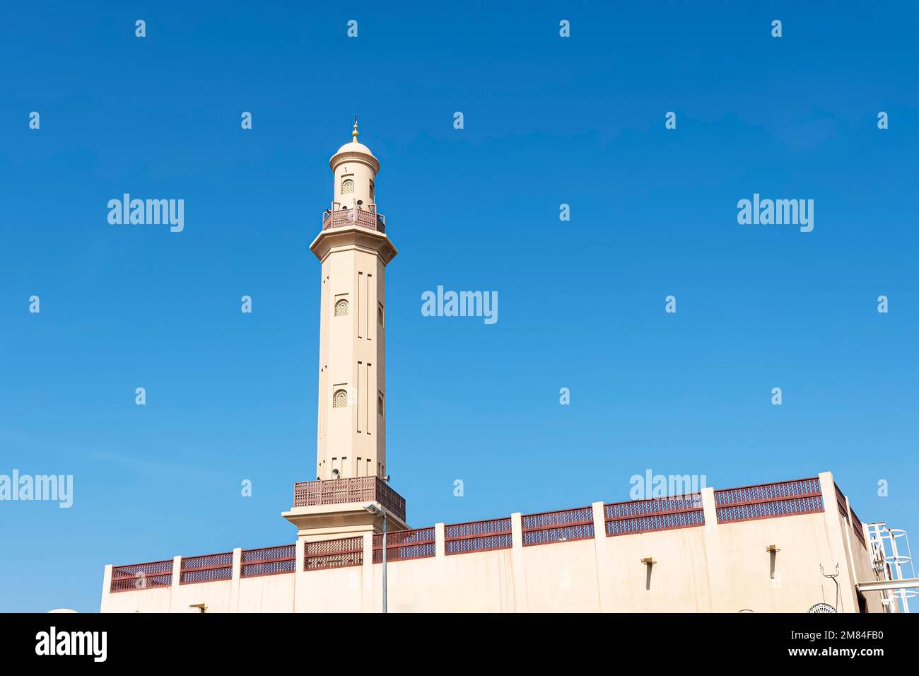 minaret of a mosque from muslim islamic culture, minarets on blue sky ...