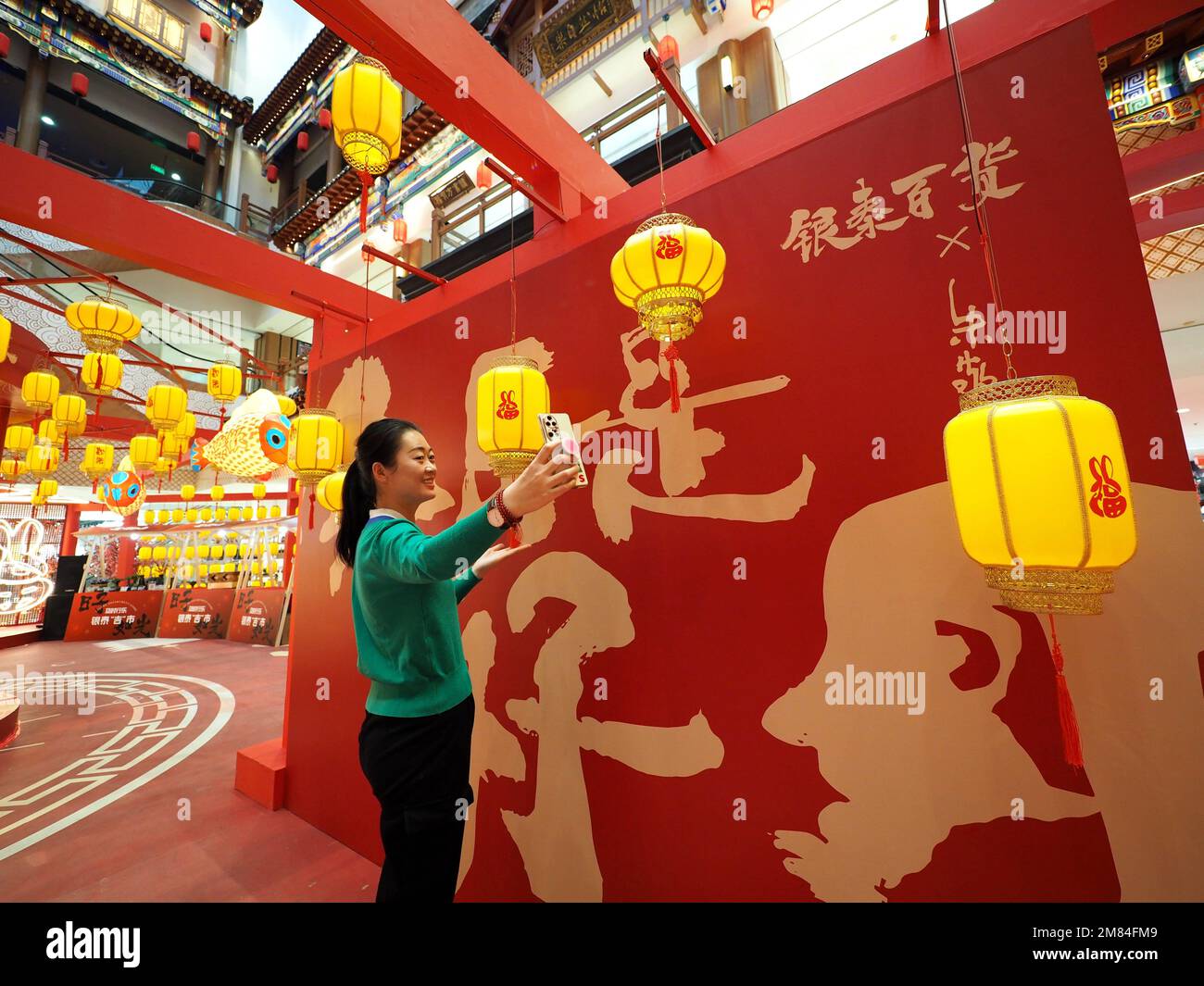 BEIJING, CHINA - JANUARY 12, 2023 - People pose for photos at the ...