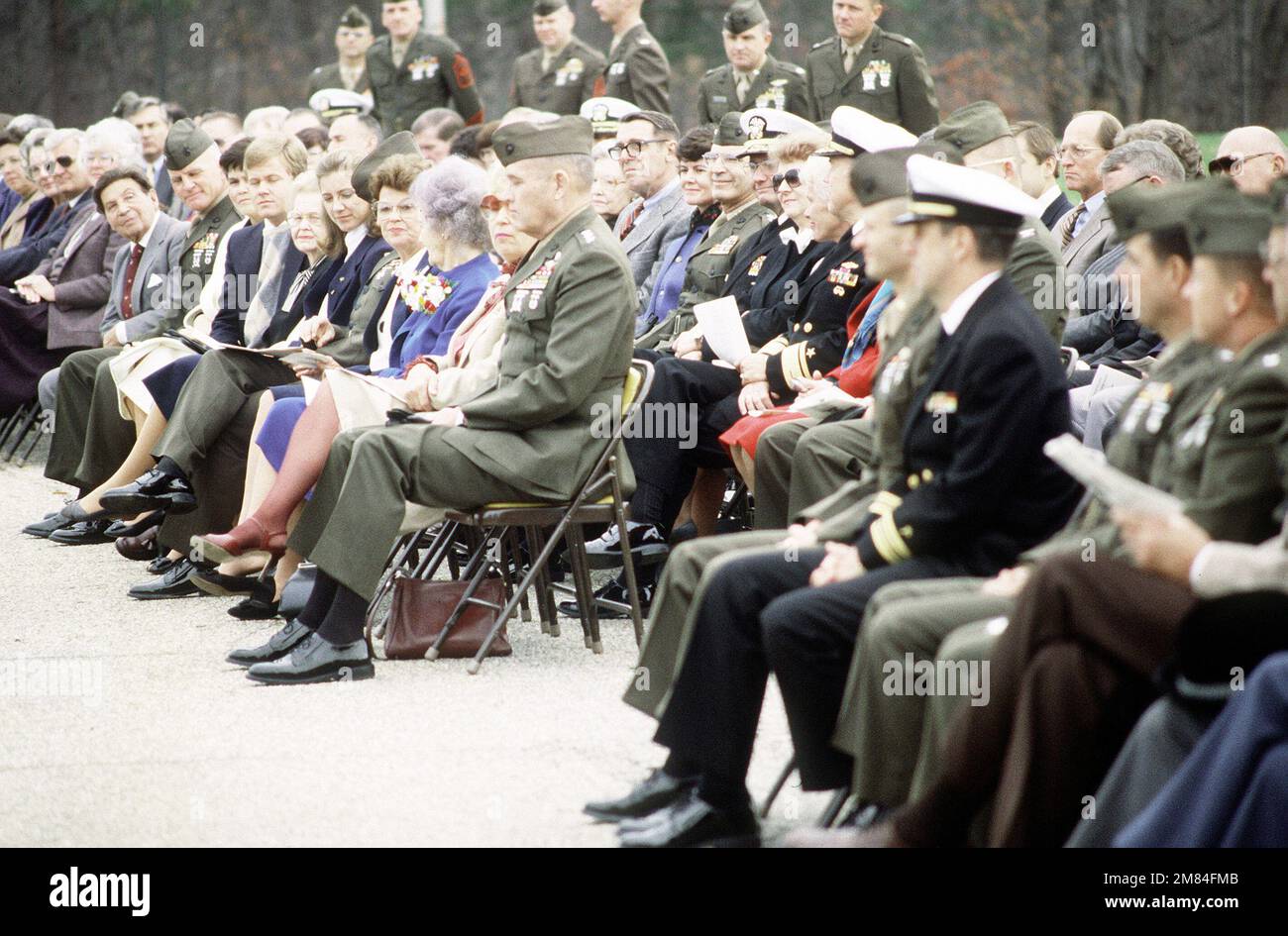 Distinguished guests attend the unveiling of a statue honoring LT. COL ...