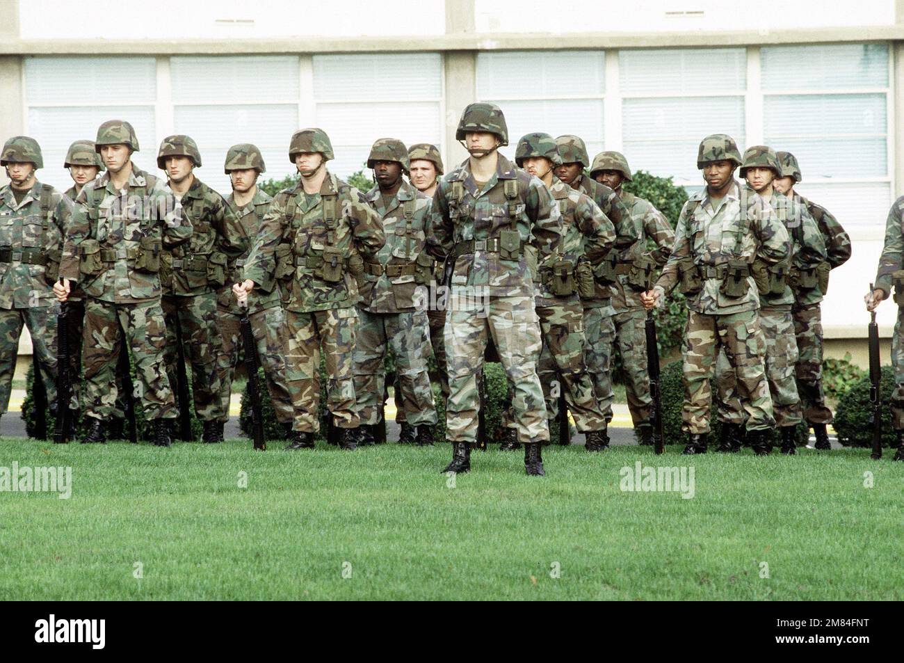 Marines stand at attention during the unveiling of a statue honoring LT ...