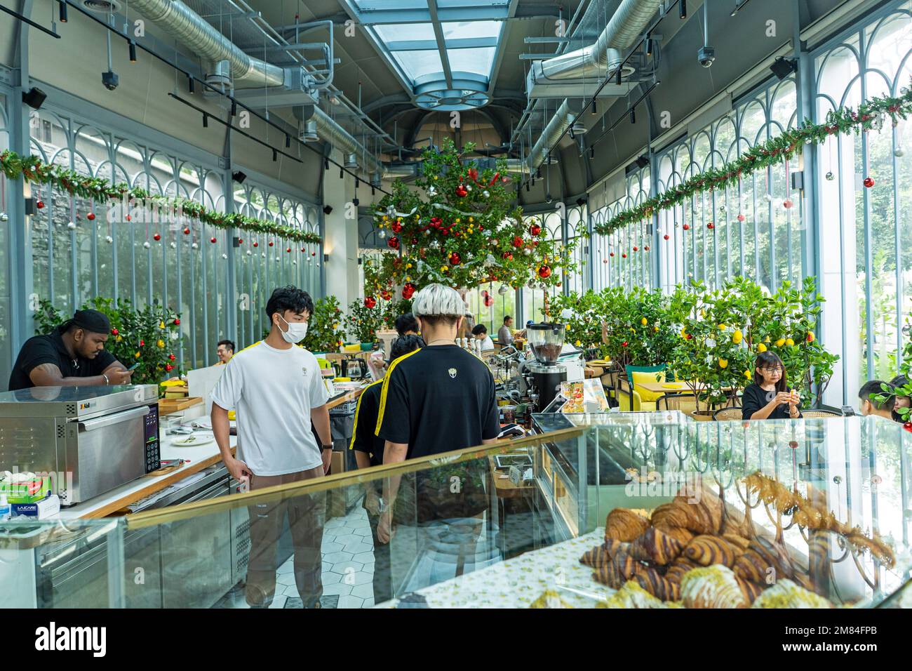 Kuala Lumpur, Malaysia - December 11th, 2022 - People having breakfast ...
