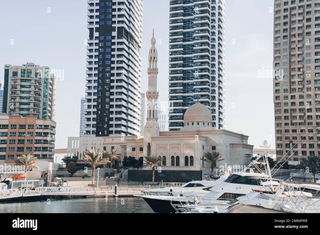 imposing large Mohammed Bin Ahmed Al Mulla Mosque between the high rise ...