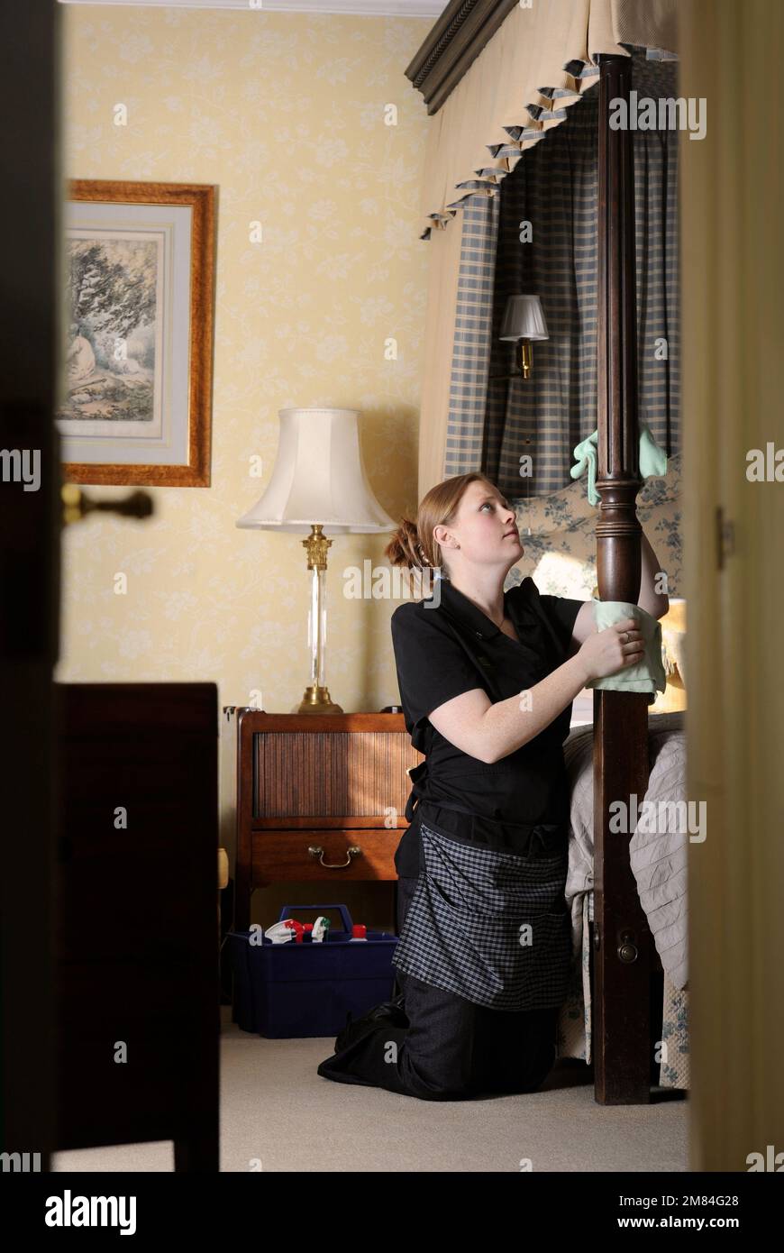 A Housekeeper preparing a hotel room Stock Photo - Alamy