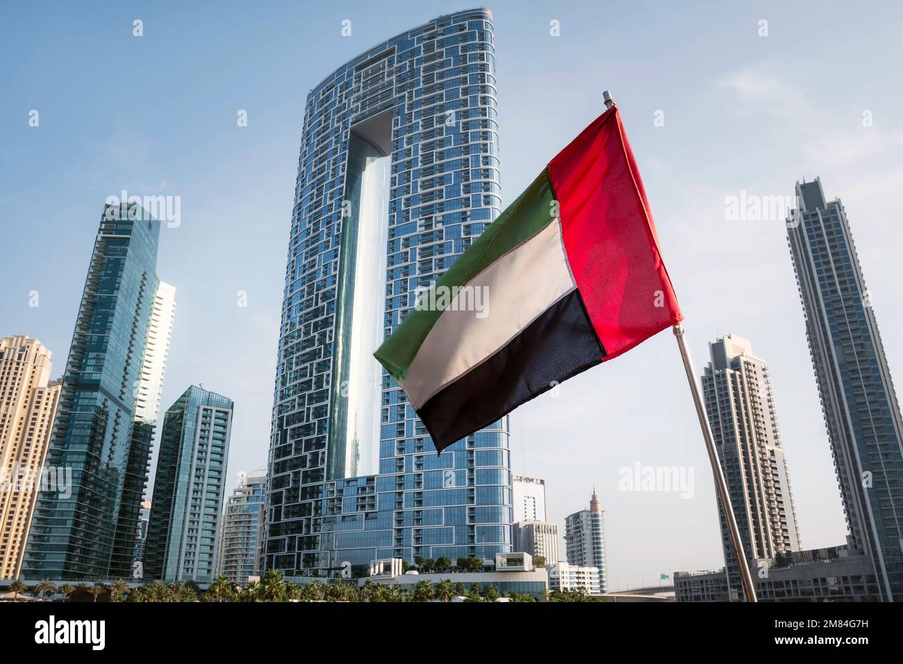 Unique view of UAE, United Arab Emirates national flag waving in the ...