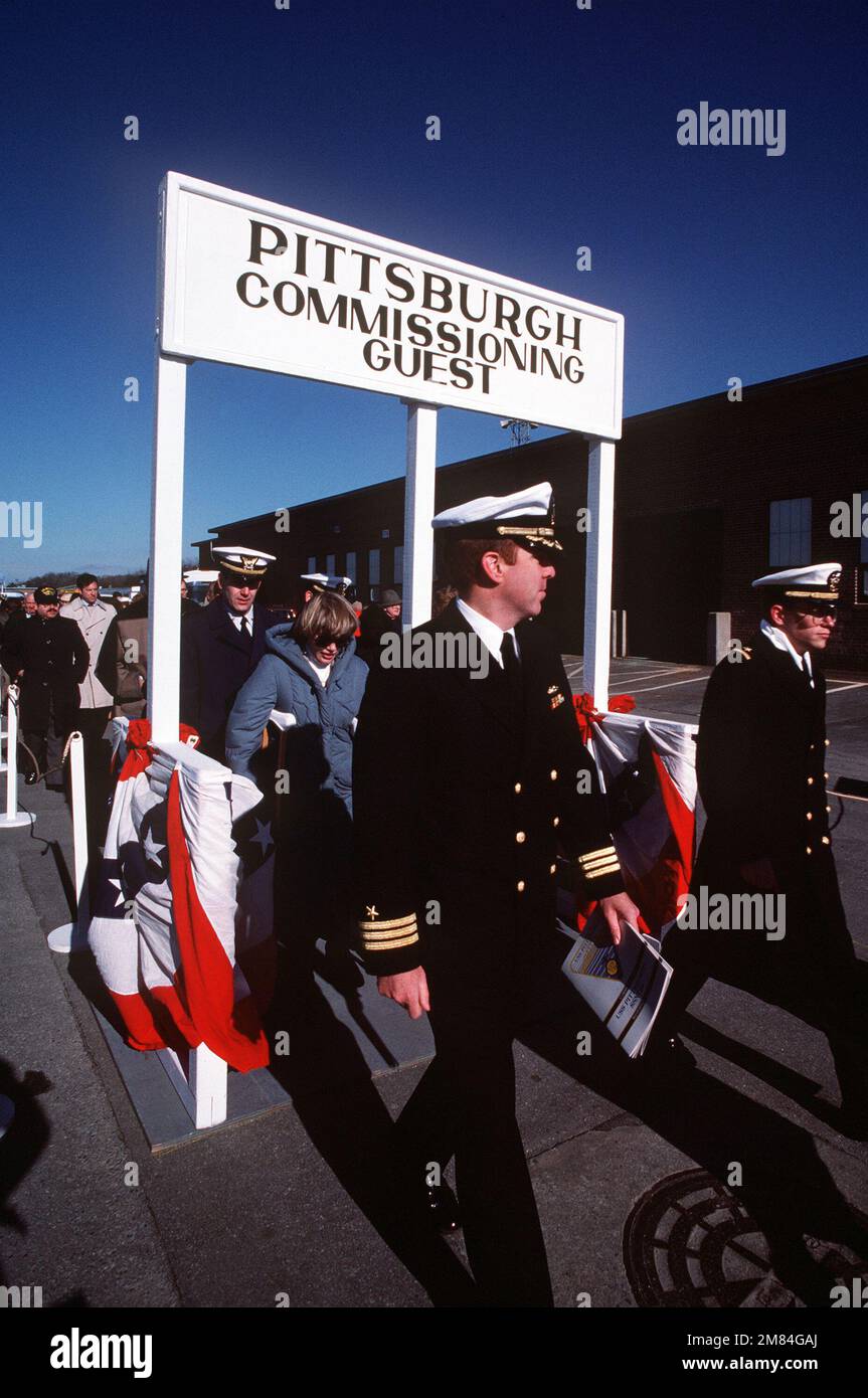 Naval officers and other guests arrive for the commissioning of the ...